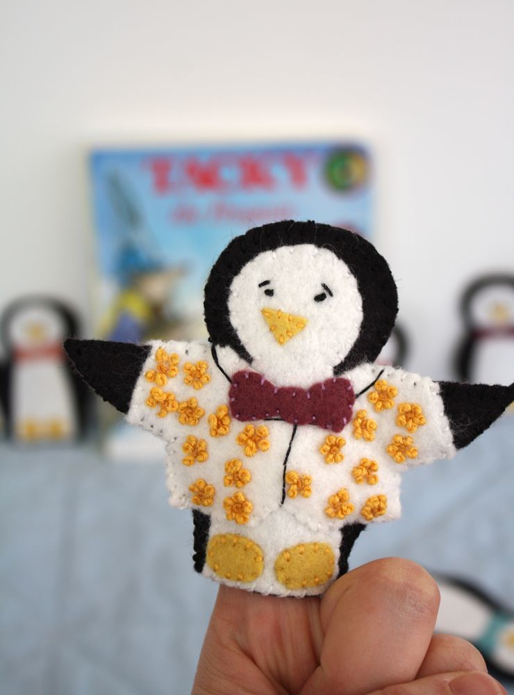 Felt Penguin Finger Puppets | AllFreeHolidayCrafts.com