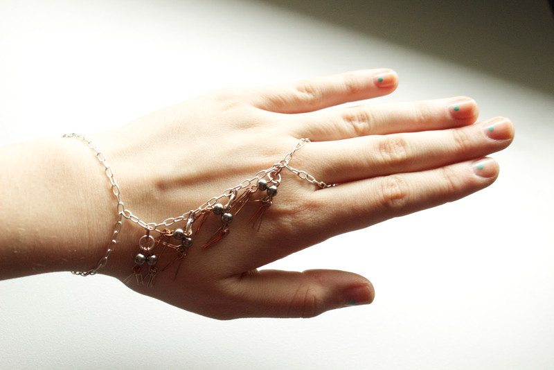 Exquisite Wire Hand Bracelet | AllFreeJewelryMaking.com