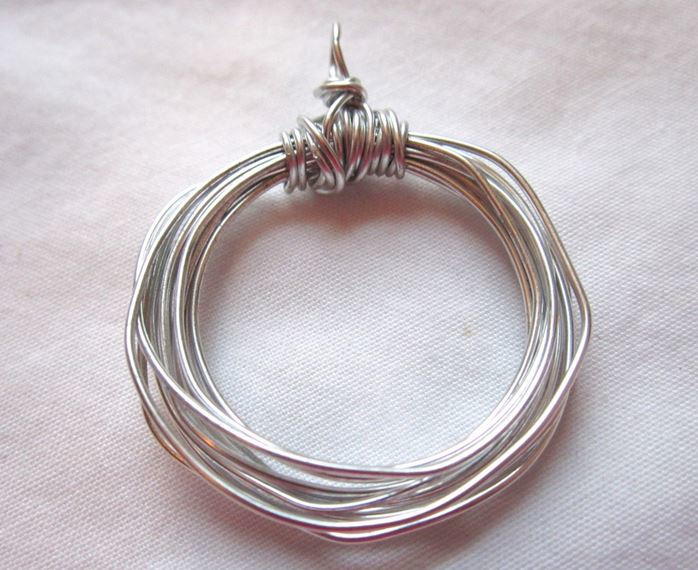 Circle Pendant Wire Wrapping Tutorial | AllFreeJewelryMaking.com