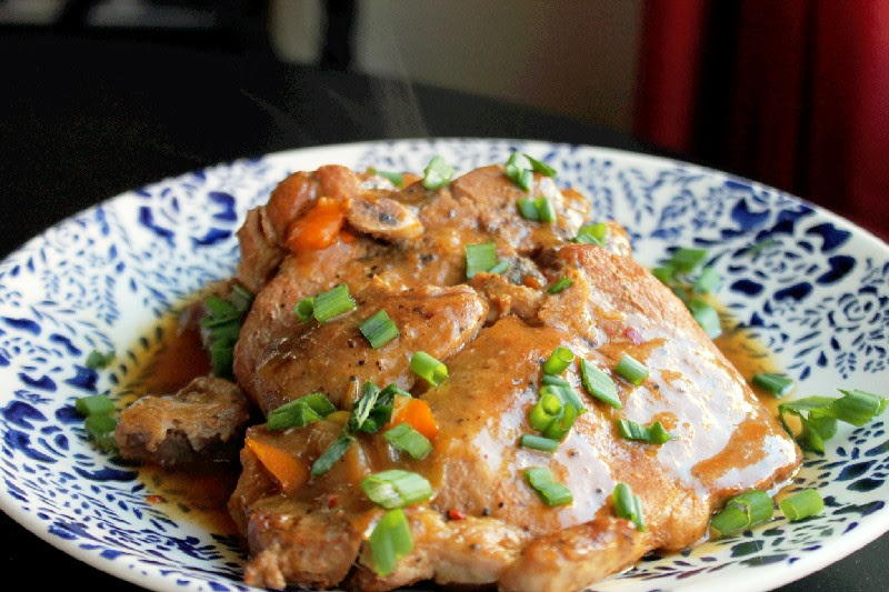 Smothered Creole Slow Cooker Pork Chops | FaveSouthernRecipes.com