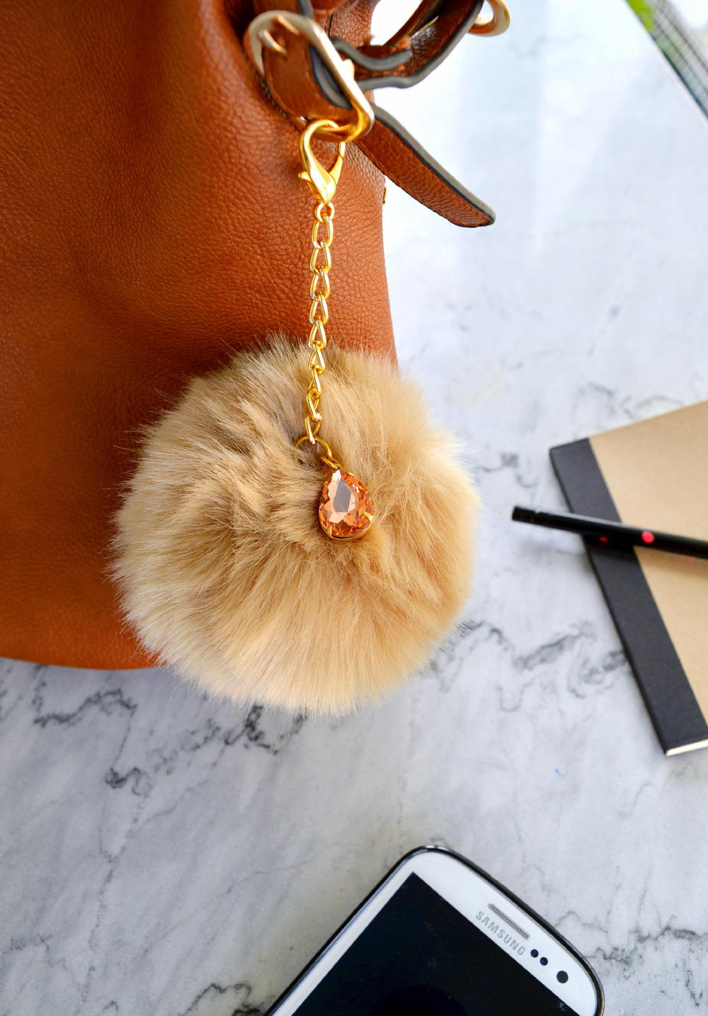 Faux Fur DIY Pom Pom | FaveCrafts.com
