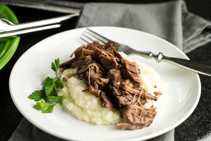 Oniony Slow Cooker Pot Roast Recipe | FaveSouthernRecipes.com