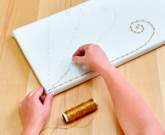 Spiderweb String Art | AllFreeHolidayCrafts.com