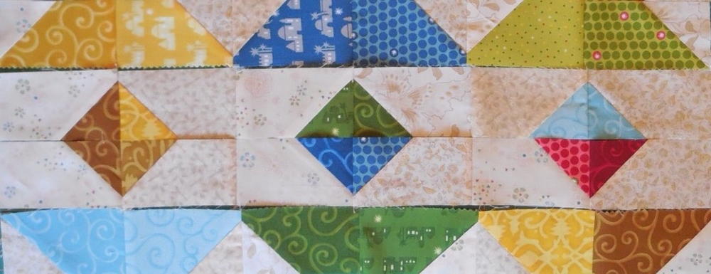 Split Triangle Row Quilt | FaveQuilts.com