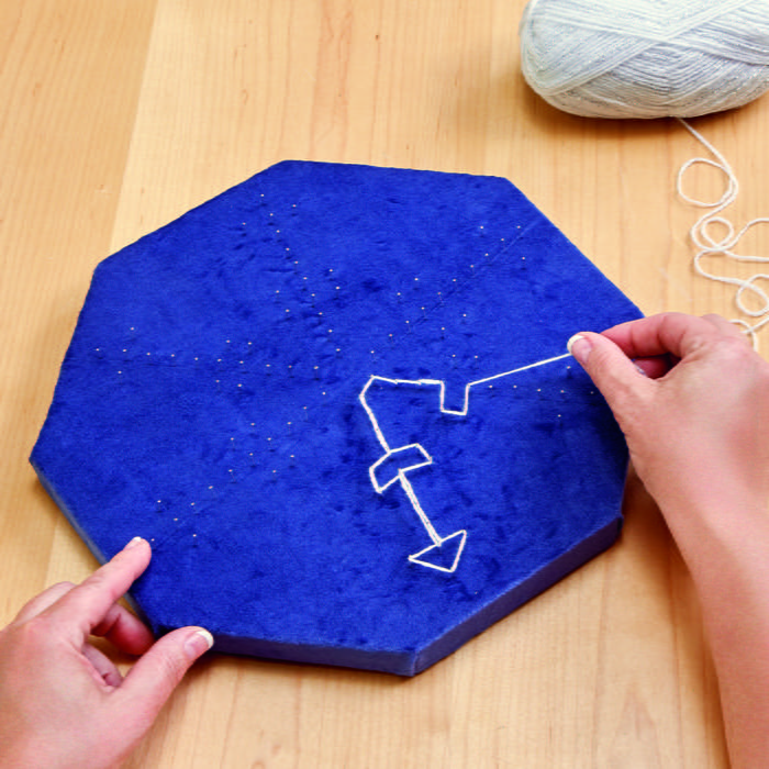 Snowflake String Art | FaveCrafts.com