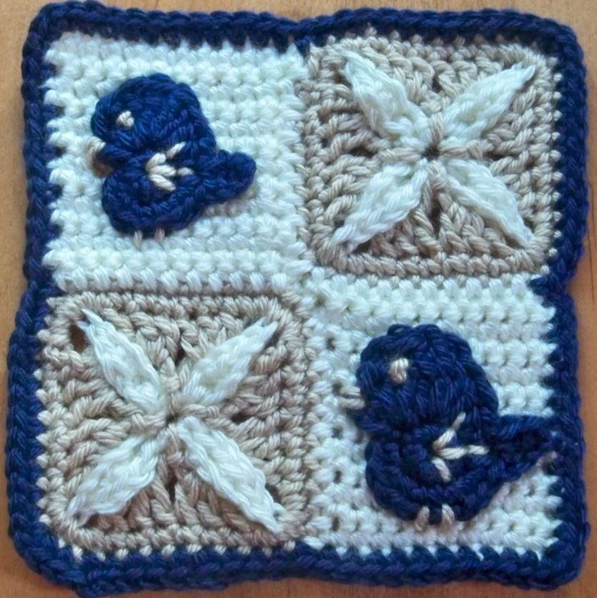Birds and Lilies Granny Square | AllFreeCrochetAfghanPatterns.com