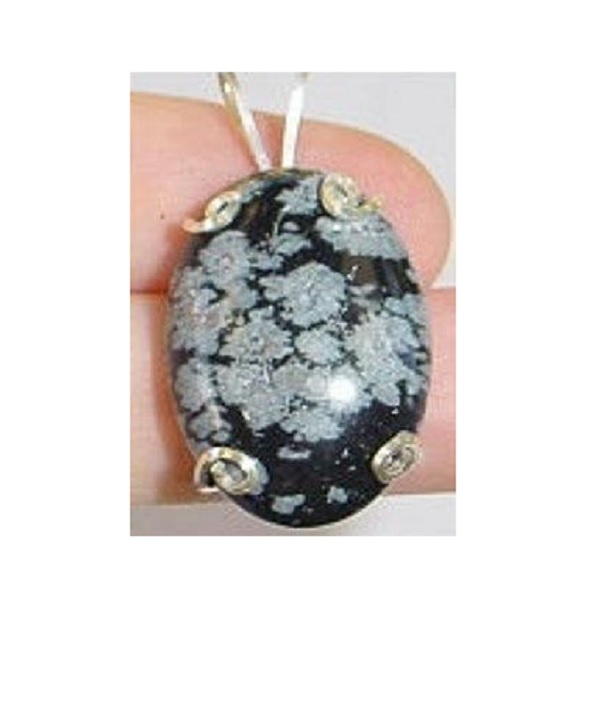 Curvy Wire Wrapped Pendant | AllFreeJewelryMaking.com