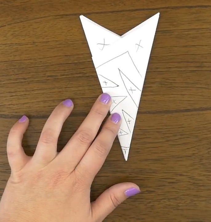 How to Make Easy Paper Snowflakes | FaveCrafts.com