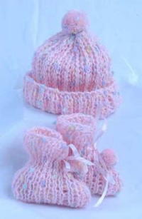 Crossover Knit Baby Booties Pattern | FaveCrafts.com
