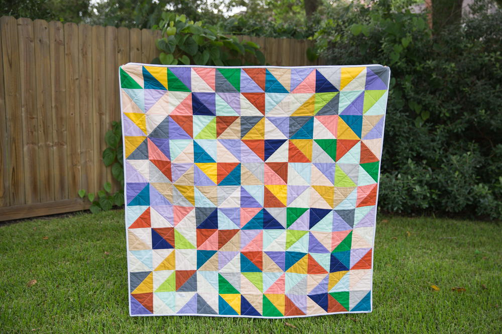 Adorable Triangle Baby Quilt | FaveQuilts.com