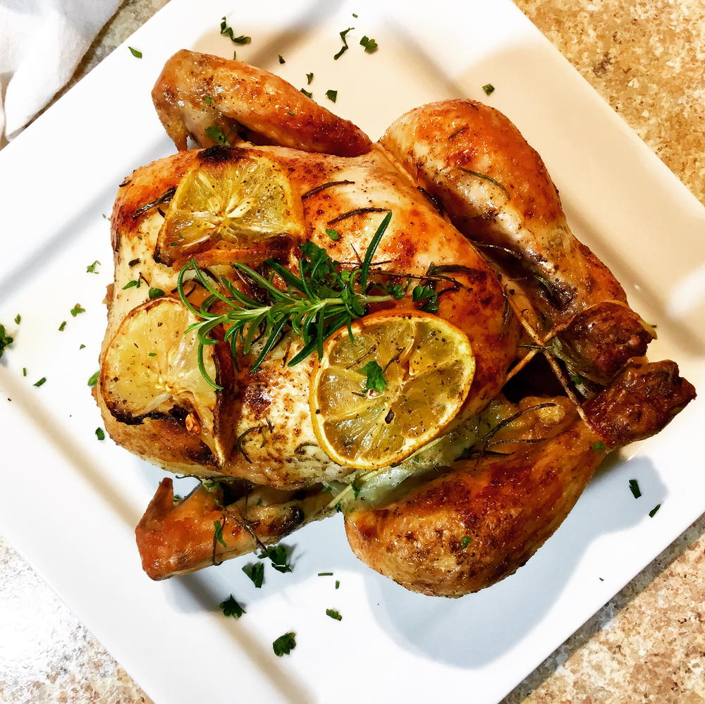 Rosemary Infused Butter and Lemon Roasted Chicken | RecipeLion.com