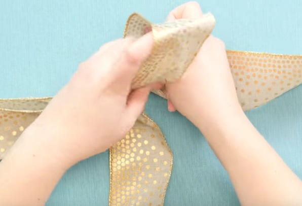 How to Tie a Simple Ribbon Bow Perfectly | FaveCrafts.com