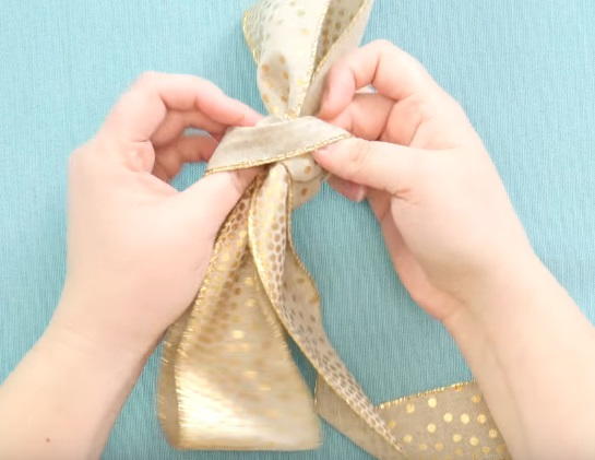 How to Tie a Simple Ribbon Bow Perfectly | FaveCrafts.com
