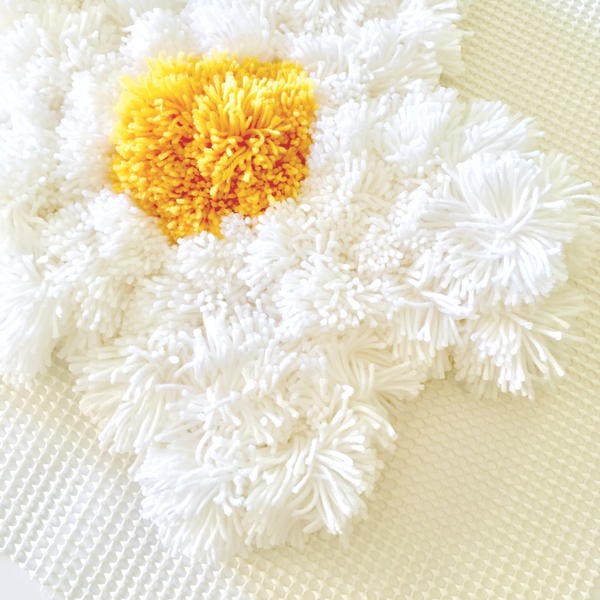 Daisy Pom Pom Rug DIY | FaveCrafts.com
