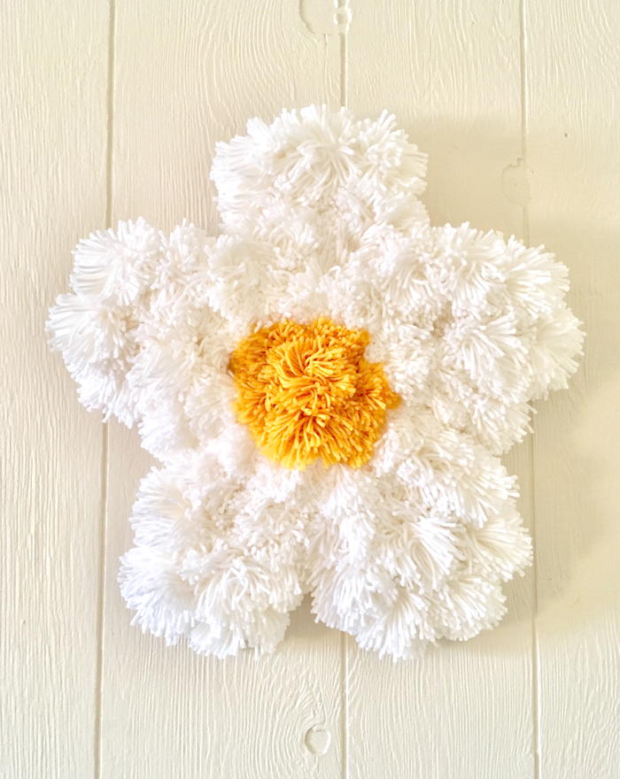 Daisy Pom Pom Rug DIY | FaveCrafts.com