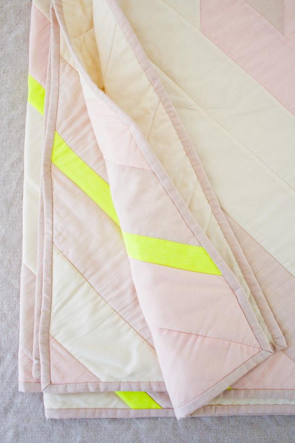 Petal Pink Diagonal Stripe Quilt | FaveQuilts.com