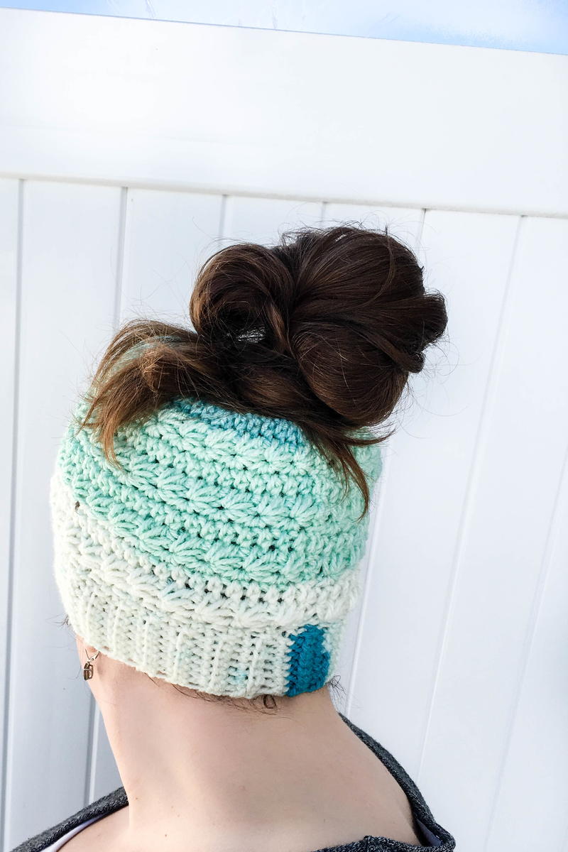 Big Button Messy Bun Beanie | AllFreeCrochet.com