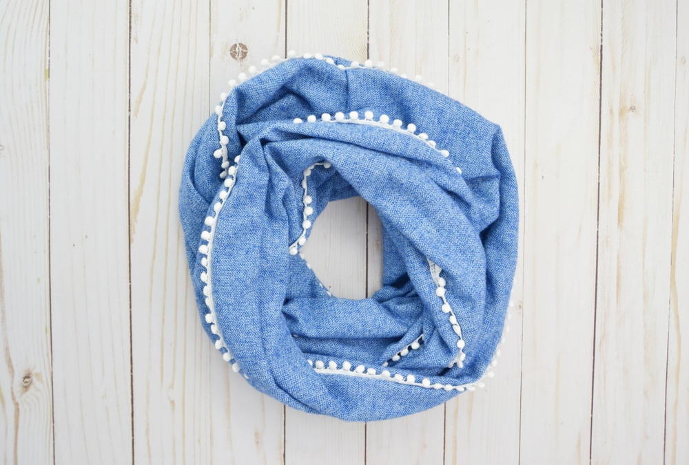 Infinity Scarf with Pom Pom Trim | AllFreeSewing.com