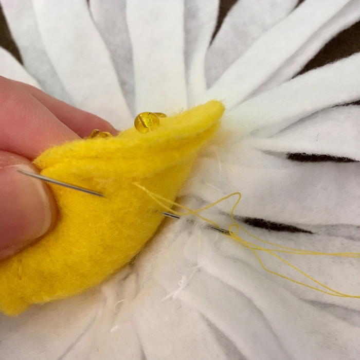Big Daisy Fabric Flower Pin Tutorial | AllFreeSewing.com