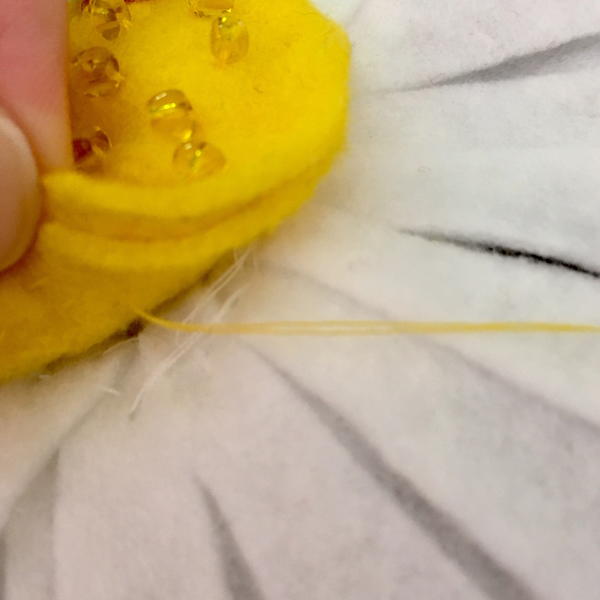 Big Daisy Fabric Flower Pin Tutorial | AllFreeSewing.com