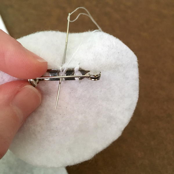 Big Daisy Fabric Flower Pin Tutorial | AllFreeSewing.com