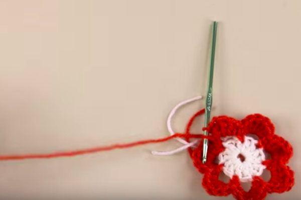 How to Crochet a Two Colored Flower | AllFreeCrochet.com