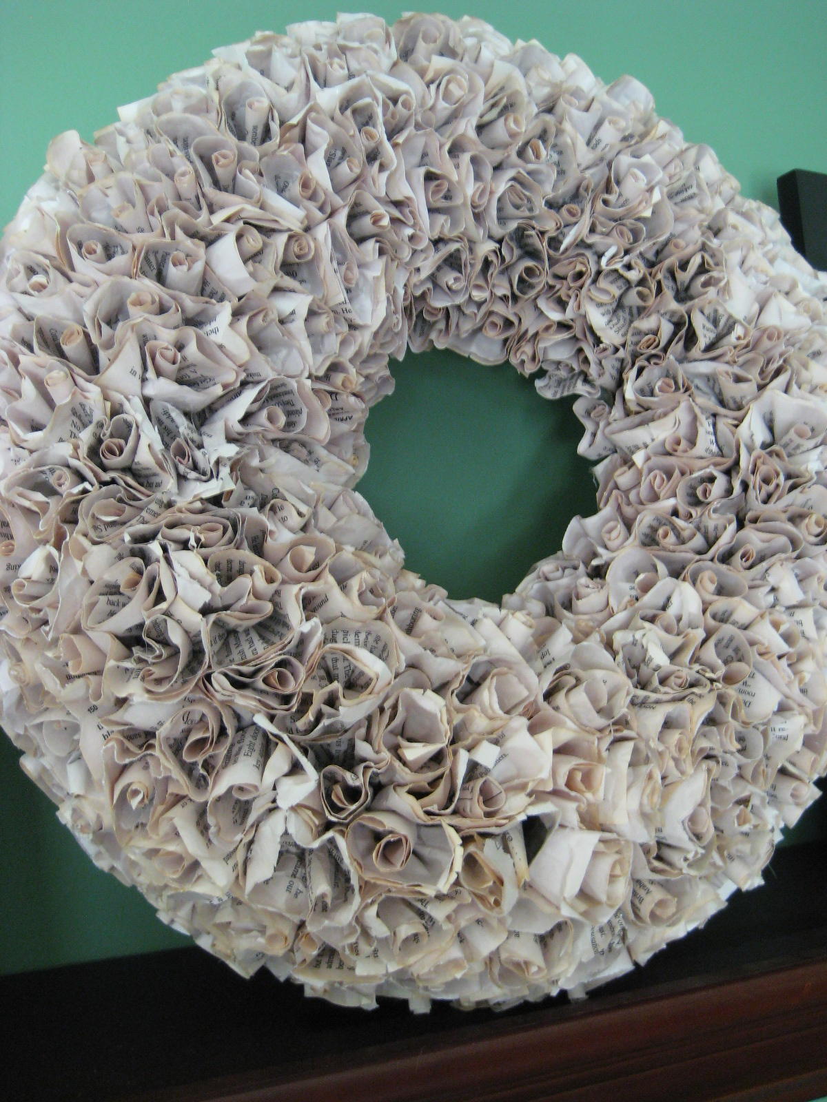 Recycled Book Rosette Wreath | AllFreeChristmasCrafts.com