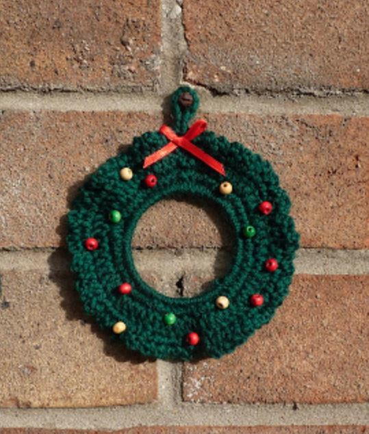 Star and Leaf Crocheted Christmas Wreath | AllFreeChristmasCrafts.com