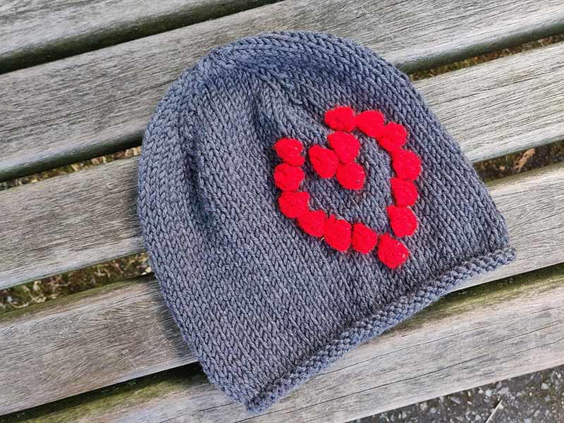 Red Heart Baby Beanie | AllFreeKnitting.com