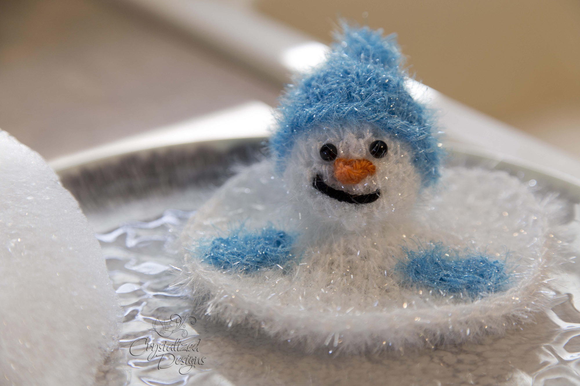 Melted Snowman Kitchen Scrubby | FaveCrafts.com