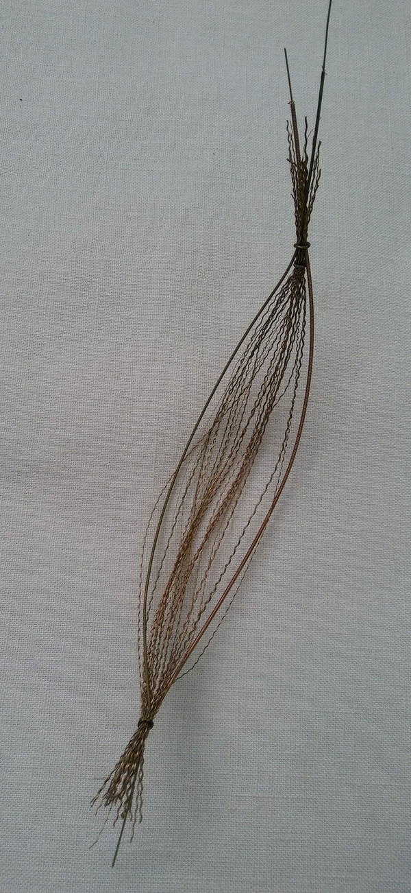 Upcycled Lily Sculpture Made From Used Guitar Strings | FaveCrafts.com