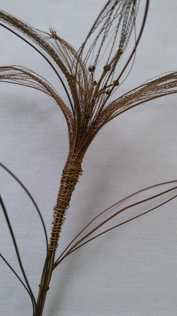 Upcycled Lily Sculpture Made From Used Guitar Strings | FaveCrafts.com