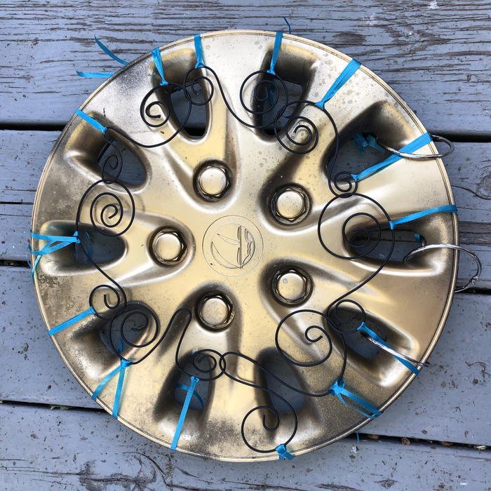 Radiant Black Butterfly Hubcap Art | FaveCrafts.com
