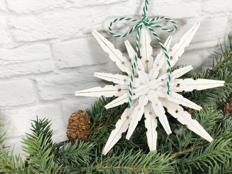 Glittery Clothespin Snowflakes | AllFreeChristmasCrafts.com