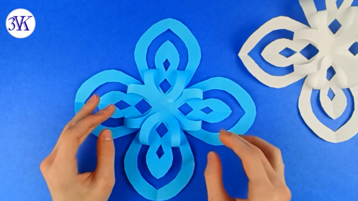 How To Make A Snowflake A Flower From Paper? | FaveCrafts.com
