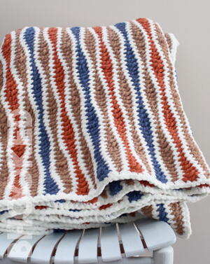 36 Colorful Crochet Afghan Patterns | FaveCrafts.com