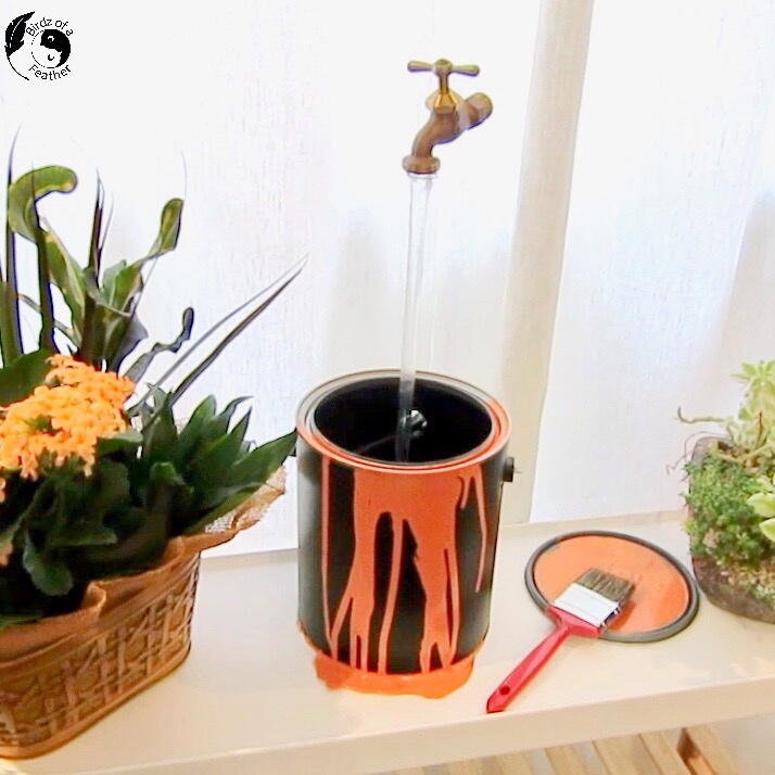Upcycled Paint Can Water Feature | DIYIdeaCenter.com