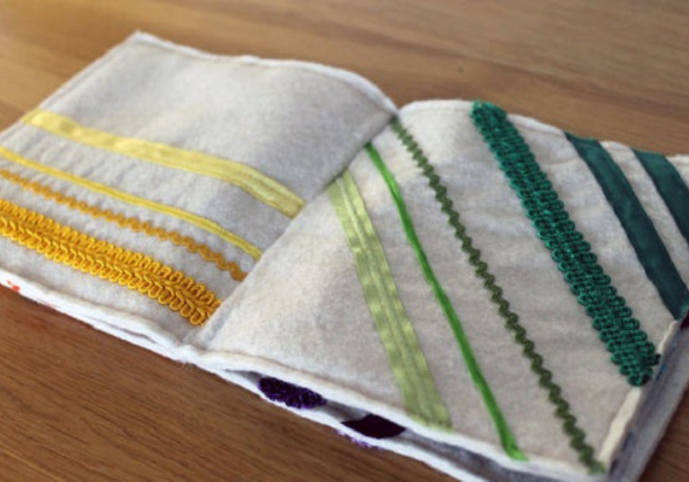 Baby's First Colorful Quiet Book Sewing Tutorial | AllFreeSewing.com