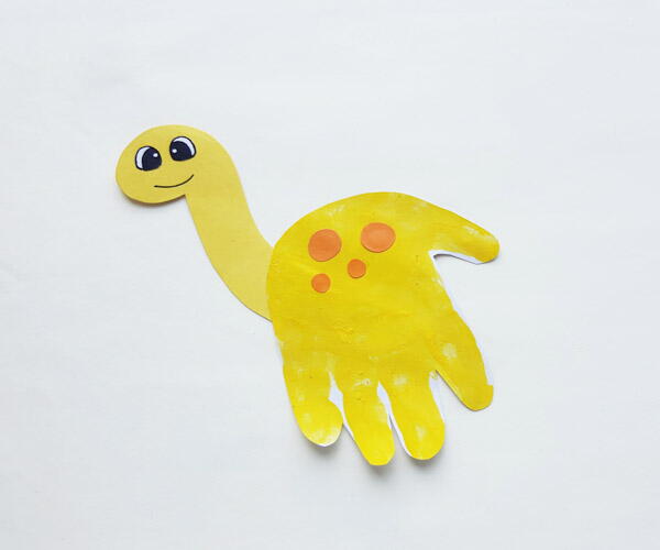 Dinosaur Handprint Craft | AllFreeKidsCrafts.com