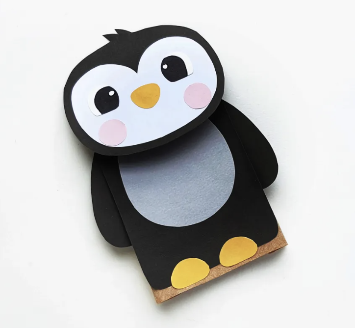 Paper Bag Penguin Puppet | FaveCrafts.com