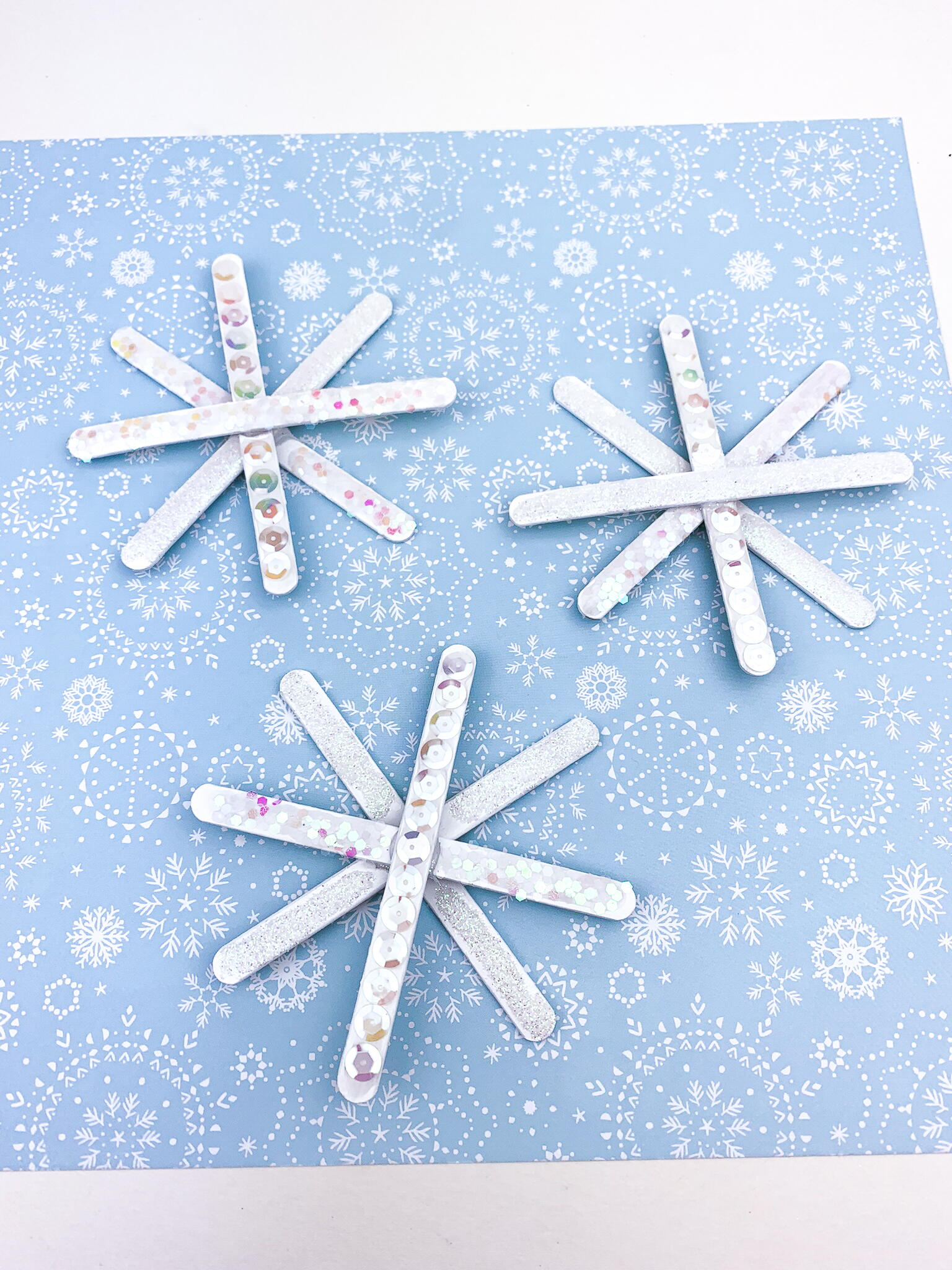 Snowflake Popsicle Stick Craft | FaveCrafts.com