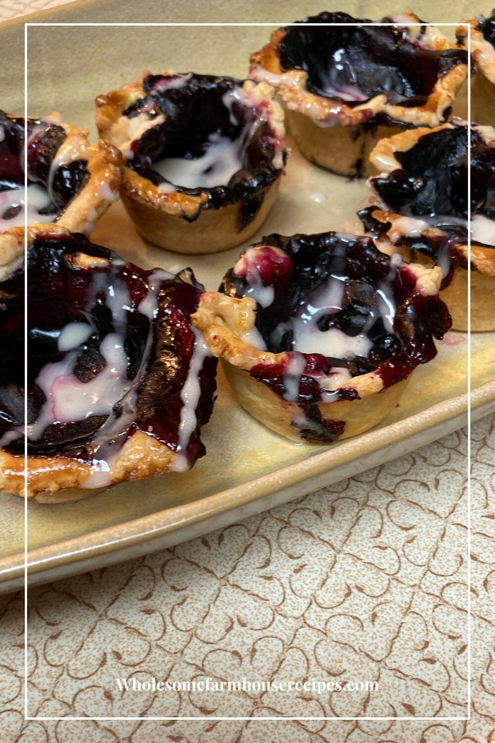 Mini Blueberry Tarts | AllFreeCopycatRecipes.com