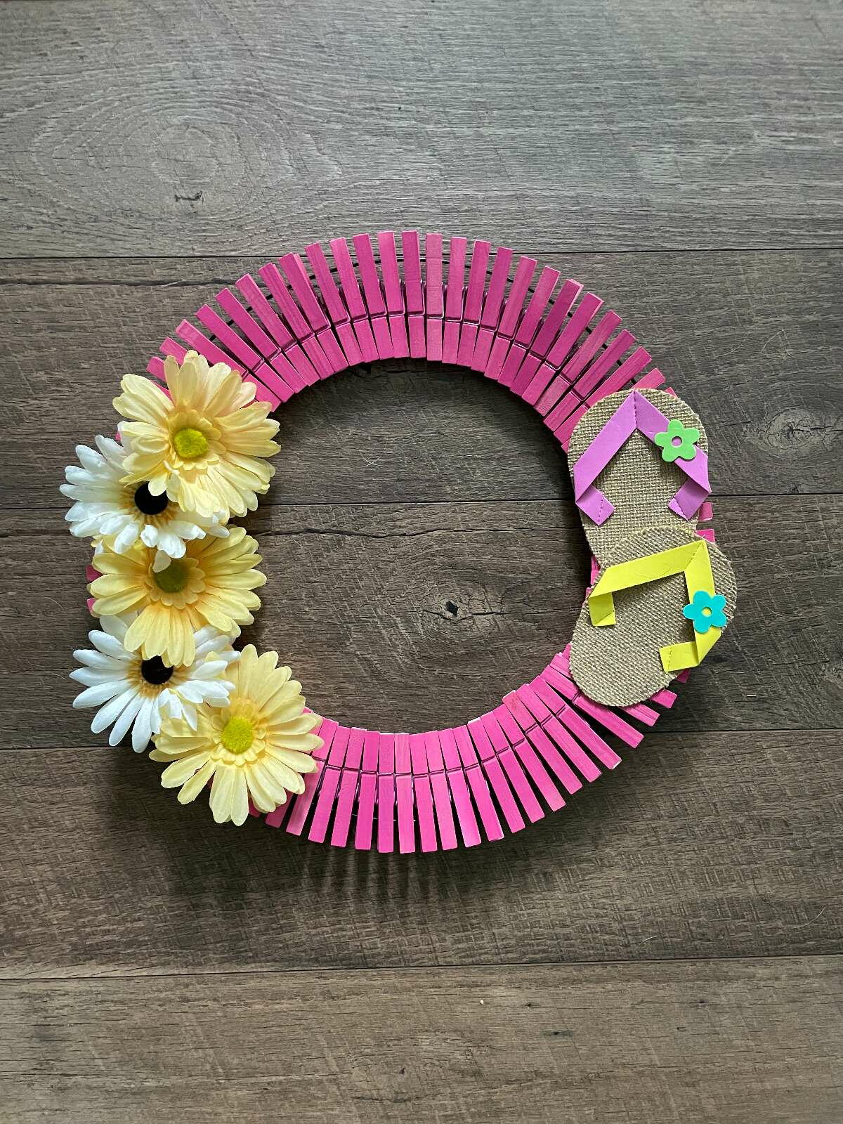 Colorful Dollar Store Clothespin Spring Wreath | FaveCrafts.com