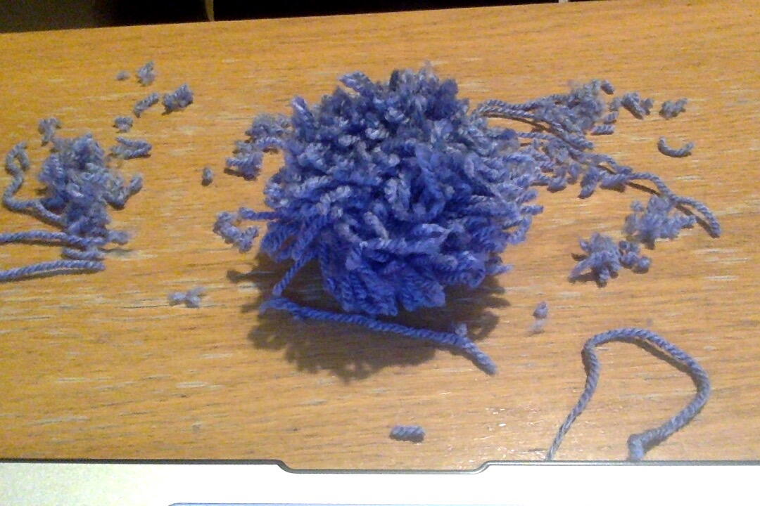 Quick And Easy Pom-poms | CheapThriftyLiving.com