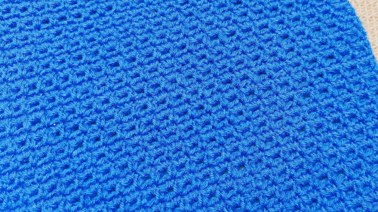 How To Crochet A Easy Sieve Stitch Blanket | FaveCrafts.com