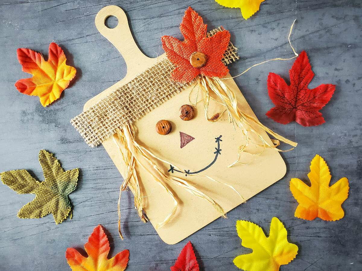 Dollar Store Cutting Board Scarecrow Craft | DIYIdeaCenter.com