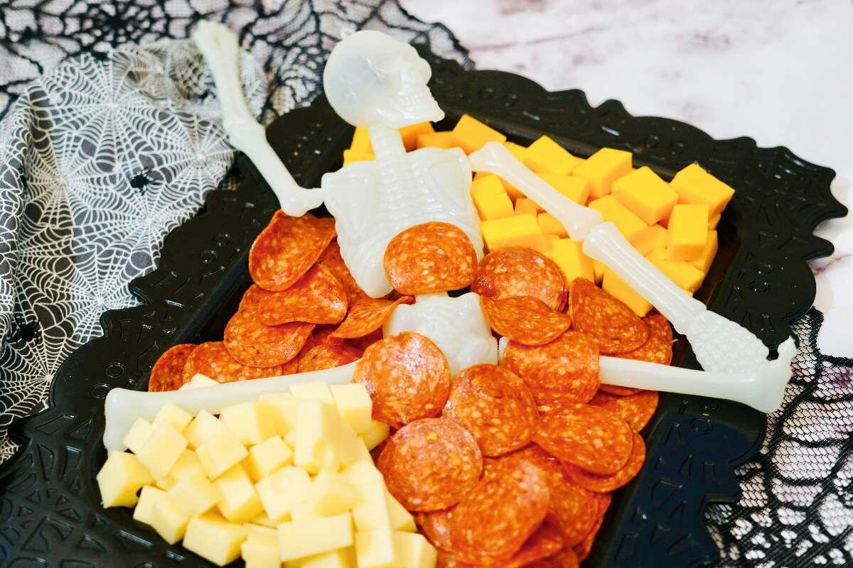 Skeleton Charcuterie Board | FaveSouthernRecipes.com