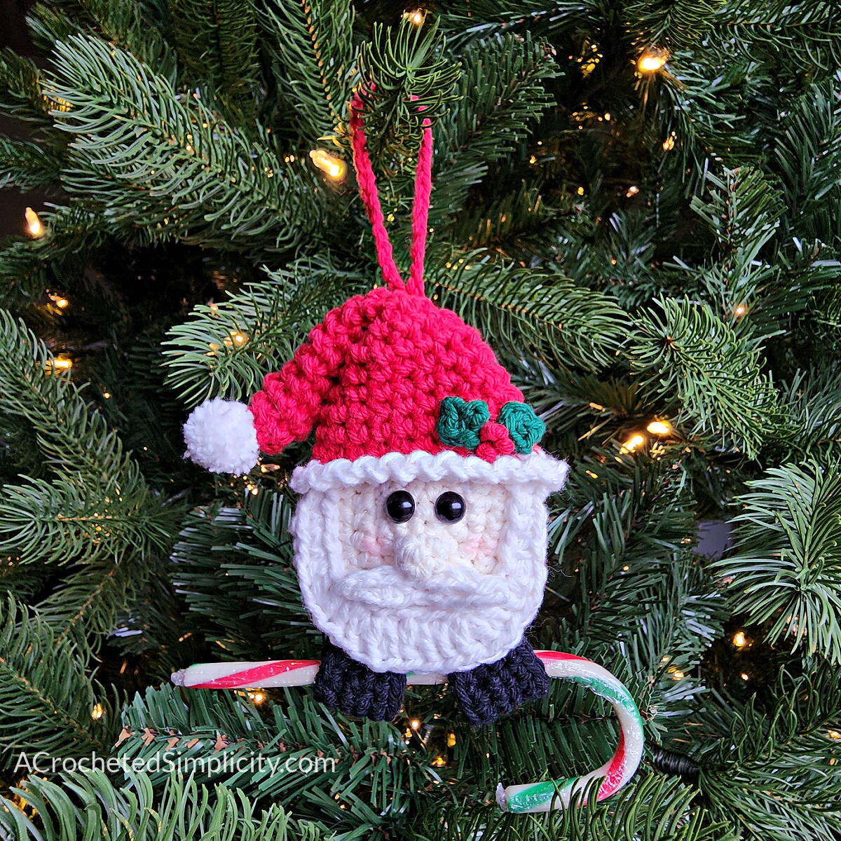 Crochet Santa Candy Cane Holder Ornament | AllFreeCrochet.com